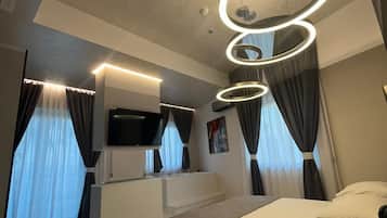 Suite Presidencial, banheira de hidromassagem | Roupa de alta qualidade, minibar, cofre no quarto, secretária