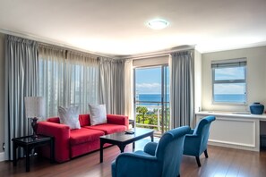 Dúplex, vista para o mar | Sala de estar | Televisor LCD 