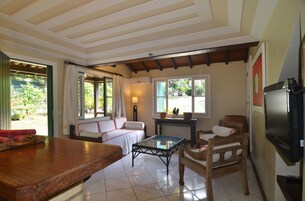 Quarto família, vista para o jardim | Vista do quarto