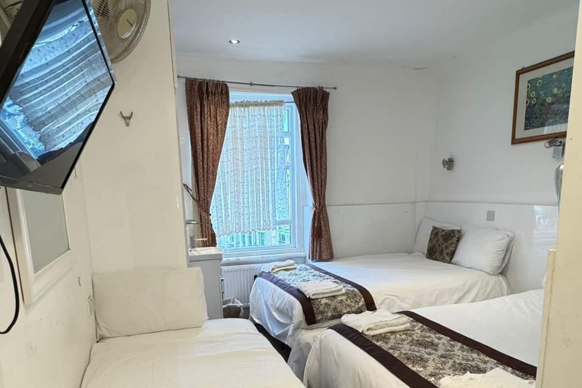 Quarto Familiar | Ferro/tábua de engomar, Wi-fi grátis, roupa de cama fornecida