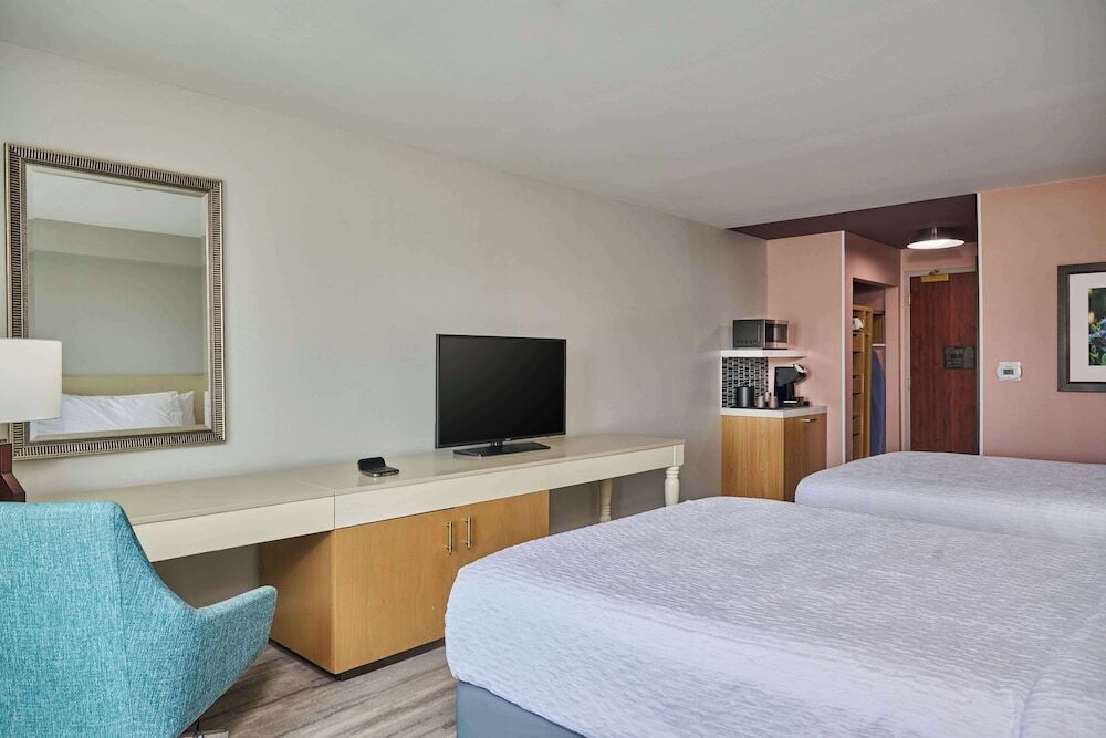 Roupas de cama premium, cofres nos quartos, individualmente mobiliados
