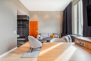 Junior Suite | Área de estar | TV