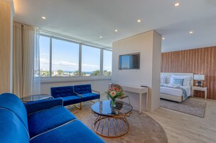 Suite Deluxe | Minibar, secretária, cortinas/cortinados opacos, quartos insonorizados 