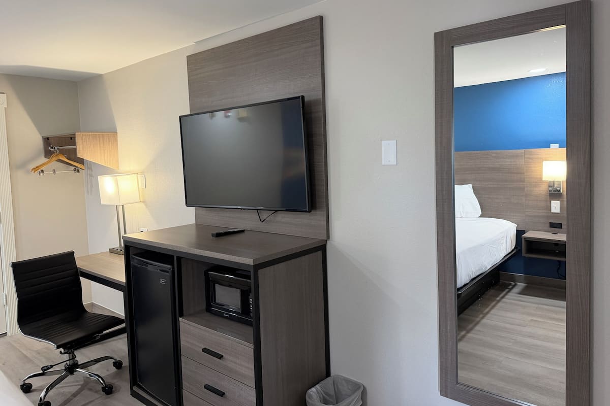 Cortinas blackout, Wi-Fi de cortesia, roupa de cama
