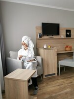 Quarto casal | Área de estar | TV