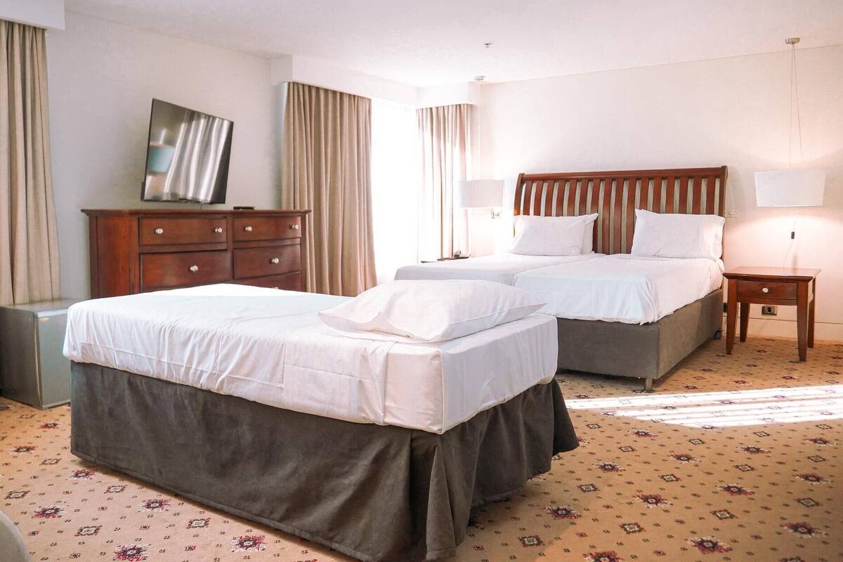 Roupas de cama premium, edredons de pluma, camas Tempur-Pedic