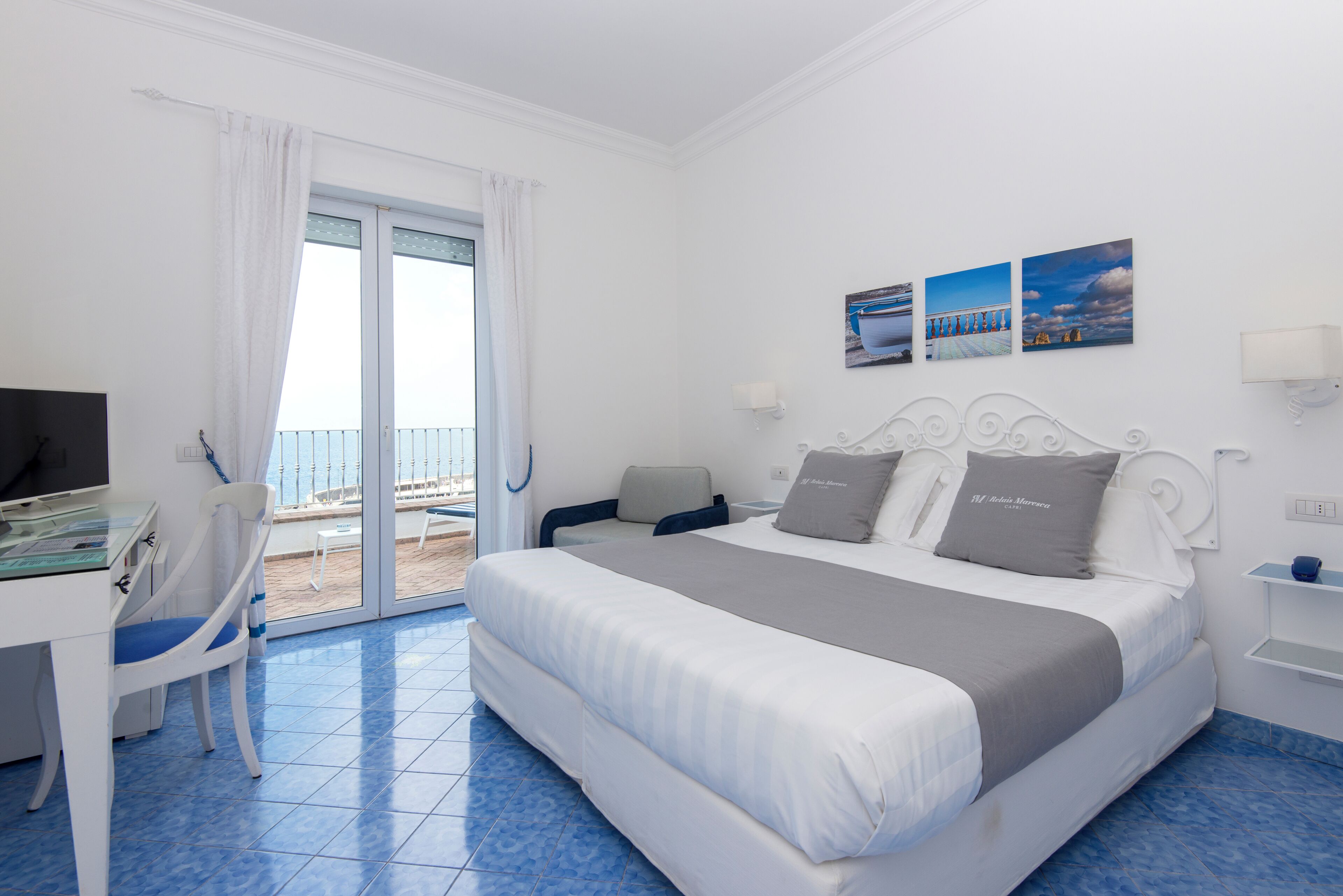 Quarto Deluxe, terraço, vista para o mar | Minibar, cofre no quarto, secretária, quartos insonorizados 