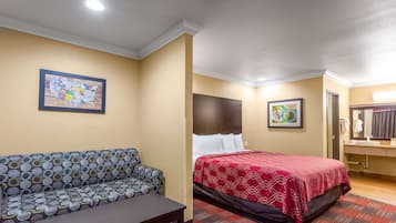 Suite, 1 cama king-size e sofá-cama, não fumadores | Cortinas/cortinados opacos, ferro/tábua de engomar, Wi-fi grátis