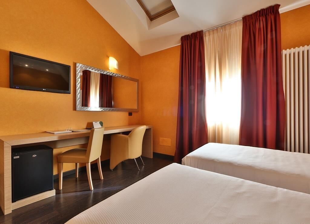 Roupa hipoalergénica, edredões de penas, minibar 