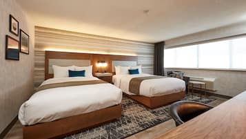 Roupas de cama premium, cofres nos quartos, escrivaninha