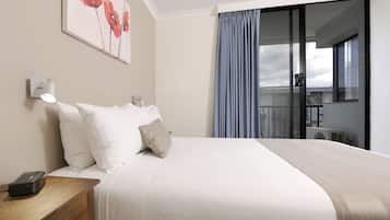 Apartamento, 1 quarto | 2 quartos, ferros/tábuas de passar roupa, roupa de cama