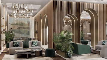 Uma sala de estar moderna com sofá, mesa de centro e uma planta decorativa.
