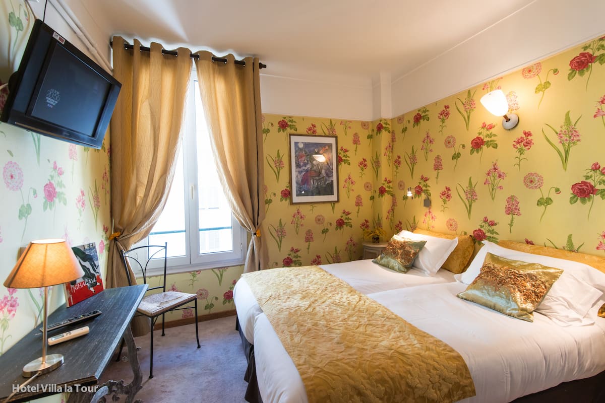 Quarto Duplo ou Twin Tradicional | Cofre no quarto, secretária, ferro/tábua de engomar, Wi-fi grátis 