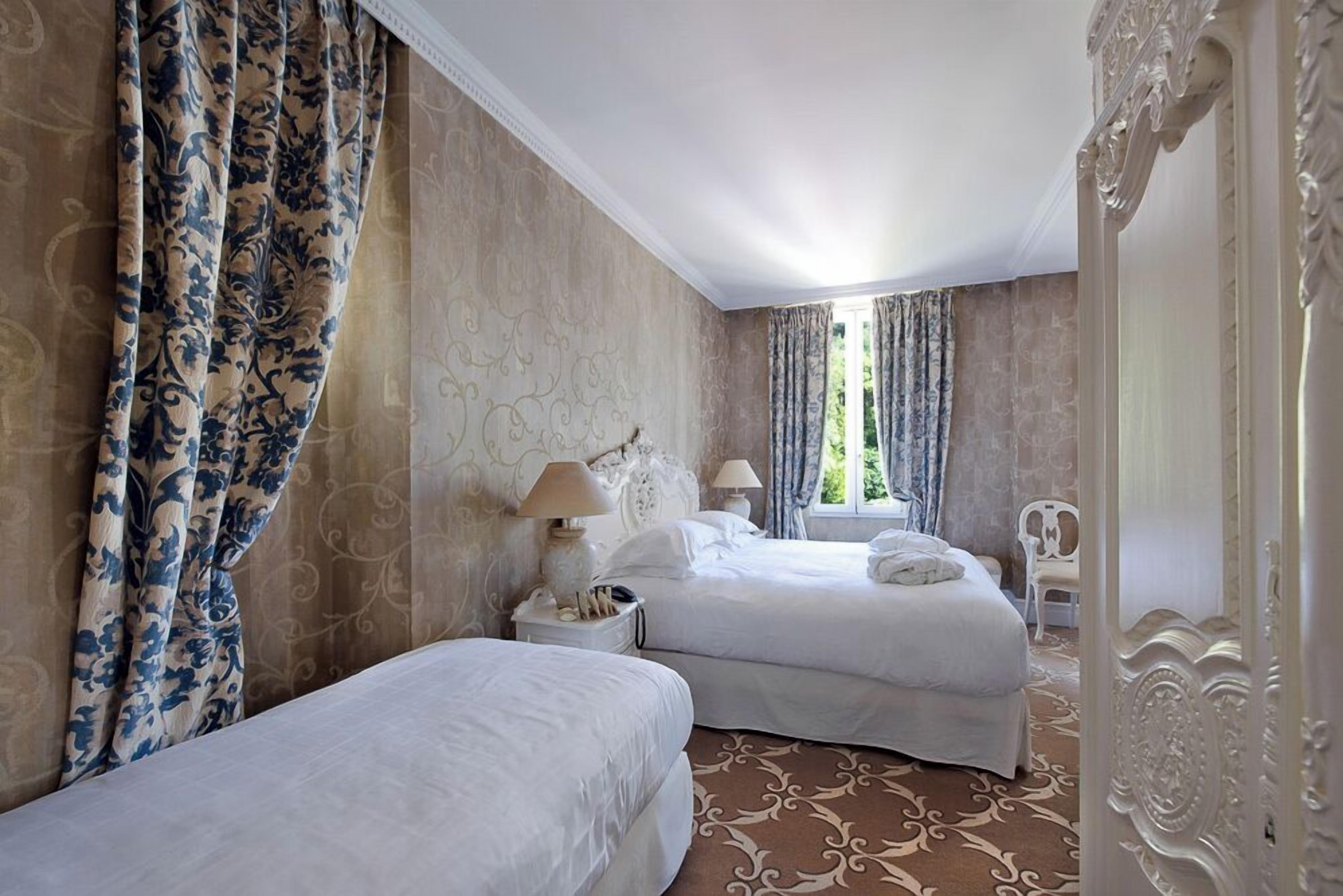 Quarto luxo, vista para o jardim | Roupas de cama premium, frigobar (abastecido com itens grátis)