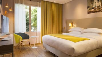 1 quarto, minibar, cofre com capacidade para portátil