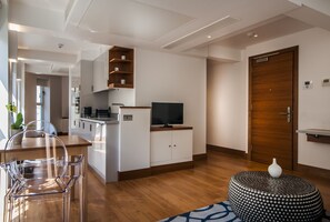 Apartamento, 1 quarto | Área de estar | TV LCD