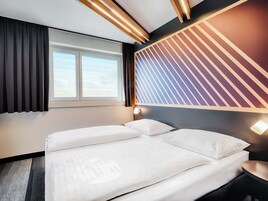 Quarto casal premium | Escrivaninha, cortinas blackout, quartos à prova de som