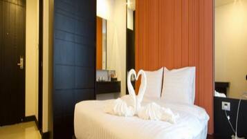 Deluxe Room King Or Twin | Frigobar, cofres nos quartos, escrivaninha, cortinas blackout