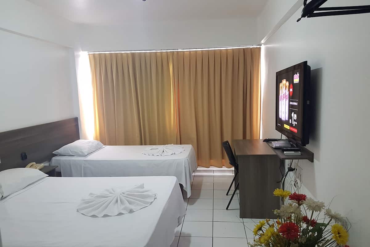 Quarto Individual | Minibar, cofre no quarto, secretária, Wi-fi grátis