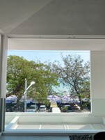 Suíte, banheira de imersão, vista para o mar | Terraço/pátio