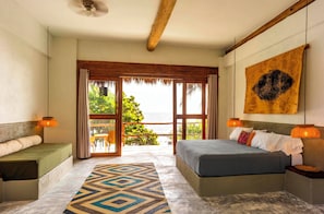 Suíte júnior, 1 cama King | Cofres nos quartos, escrivaninha, Wi-Fi de cortesia, roupa de cama