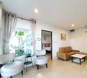 Cabana Villa  | Sala de estar | TV LCD 32 polegadas com canais a cabo, TV, DVD player