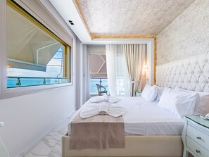 Junior Suite Sea View | Roupas de cama premium, frigobar, cofres nos quartos