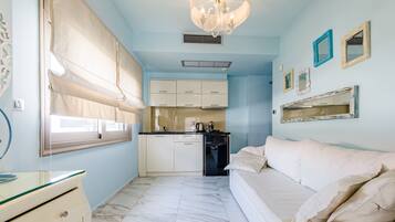 Junior Suite Sea View | Roupas de cama premium, frigobar, cofres nos quartos