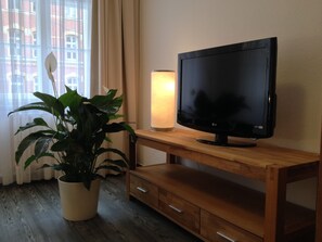 Apartamento, 1 quarto | 1 quarto, secretária, ferro/tábua de engomar 