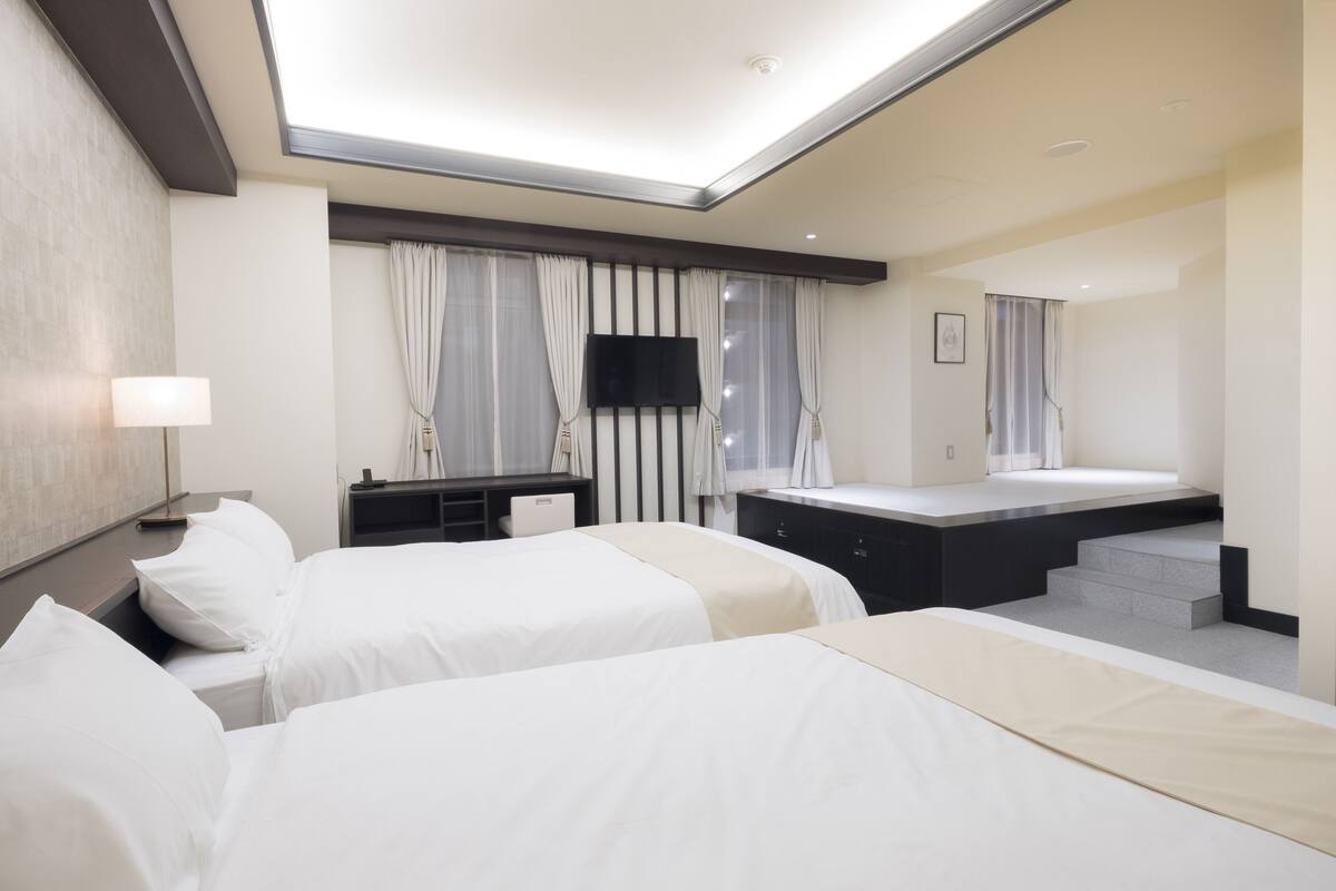Quarto Deluxe, não fumadores (Twin) | Edredões de penas, ferro/tábua de engomar, Wi-fi grátis 