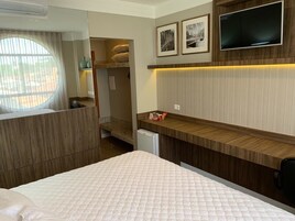 Quarto duplo premium, 1 cama King | Comodidades do quarto