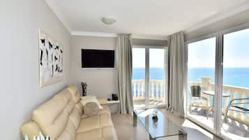 Apartamento Superior, 3 quartos | Sala | Televisor LED de 40 polegadas com canais via satélite, televisor
