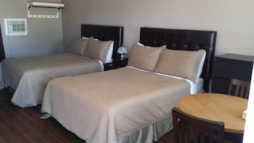 Roupas de cama premium, escrivaninha, camas extras/dobráveis (sobretaxa)