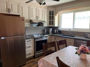 Apartamento família | Cozinha privada | Cooktop