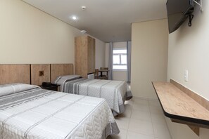 Quarto duplo | Frigobar, berços grátis, Wi-Fi de cortesia, roupa de cama