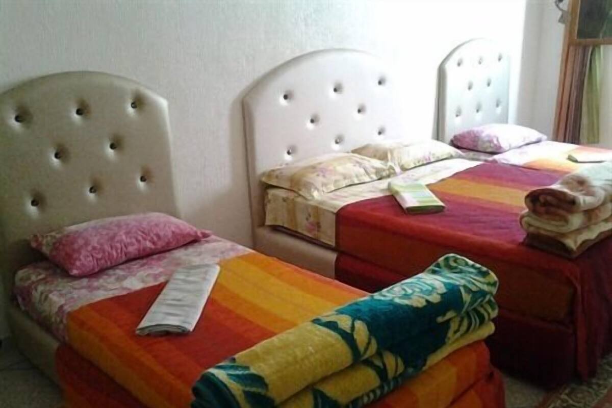 Apartamento, 2 quartos, vista para a piscina | Cofre no quarto, cortinas/cortinados opacos, ferro/tábua de engomar