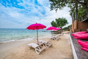 Na praia, toalhas de praia 