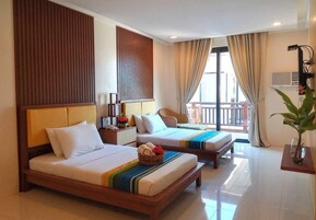 Quarto, 2 quartos | Frigobar, roupa de cama