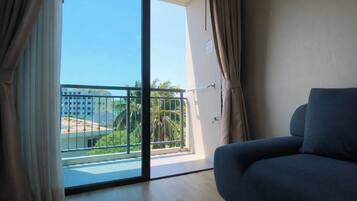 Suite Júnior | Sala de estar | Televisor LCD