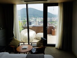 Quarto standard | Roupas de cama premium, cortinas blackout, Wi-Fi de cortesia