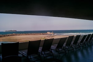 Na praia, toalhas de praia