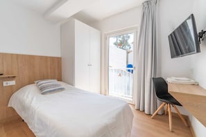 Quarto Individual Deluxe | Secretária, quartos insonorizados, ferro/tábua de engomar, Wi-fi grátis 