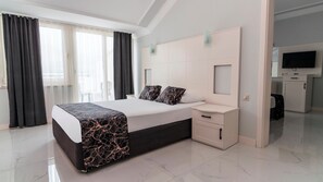 Quarto Familiar, 2 quartos | Minibar grátis, cofre no quarto 