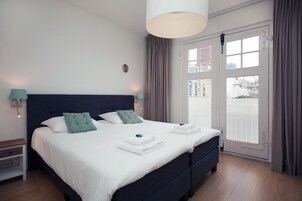 Apartamento, 1 quarto (splitlevel) | Ferro/tábua de engomar, berços/camas para crianças grátis, Wi-fi grátis