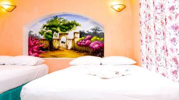 Quarto standard | Ferros/tábuas de passar roupa, roupa de cama