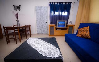 Suíte superior | Área de estar | TV LCD