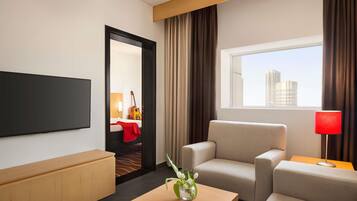 Suite, 1 quarto | Roupa de alta qualidade, cofre no quarto, secretária