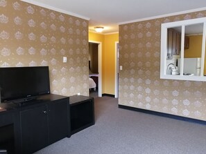 Suite Familiar, 2 quartos | 1 quarto, secretária, cortinas/cortinados opacos 