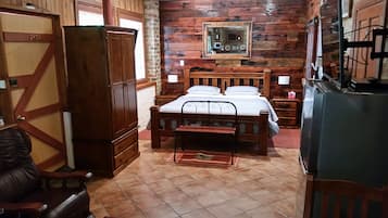 Suíte estúdio luxo, 1 cama King | 1 quarto, quartos à prova de som, ferros/tábuas de passar roupa