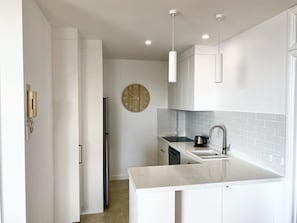 Apartamento panorâmico | Individualmente mobiliados, espaço de trabalho para notebook